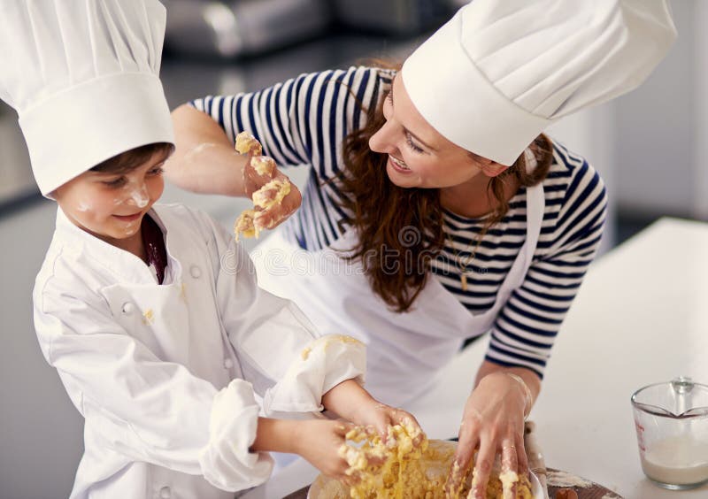 The Best Things in Life are Sweet. a Mother and Her Son Baking in the ...