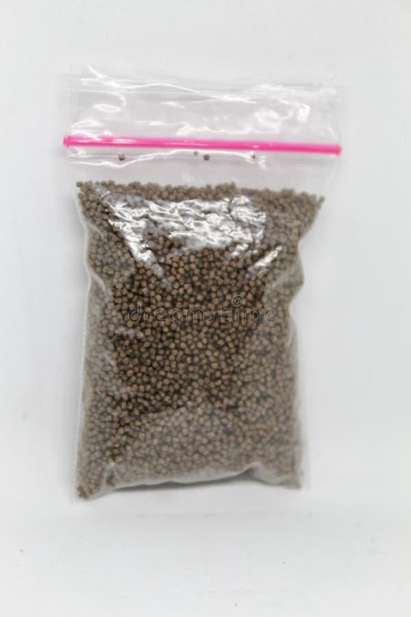 Betta Fish Food in a Plastic Container Stock Photo - Image of lighting ...