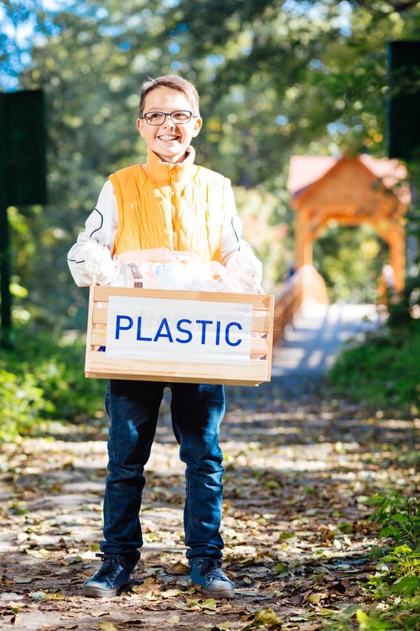 Delighted Good Looking Boy Helping the Environment Stock Image - Image ...
