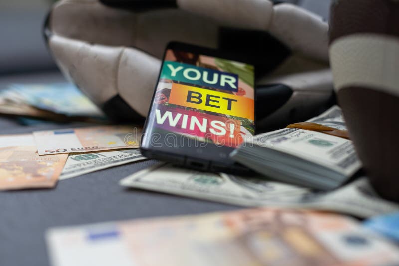 Betting on Sports, Smart Phone with Working Online Betting Mobile ...