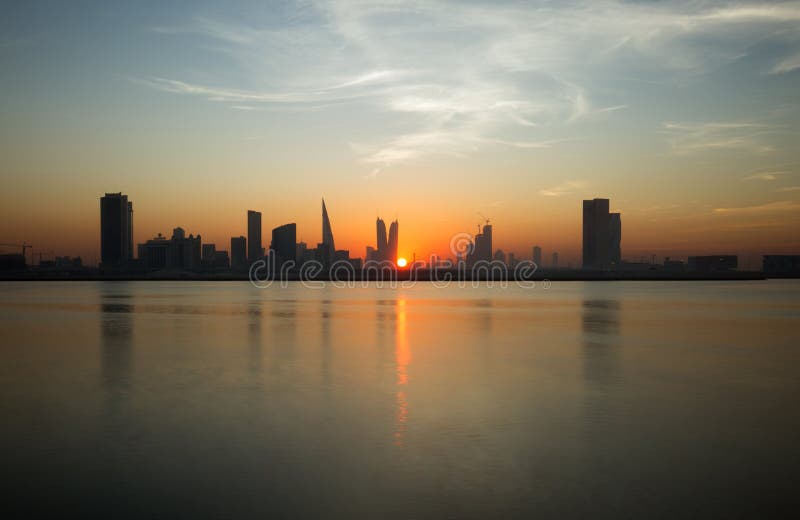 Beuatiful Sun in the Mid of Bahrain Skyline during Sunset Stock Photo ...