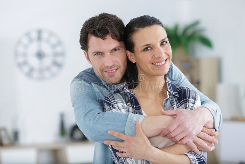 Beutiful Couple Hugging at Home Stock Photo - Image of leisureactivity ...