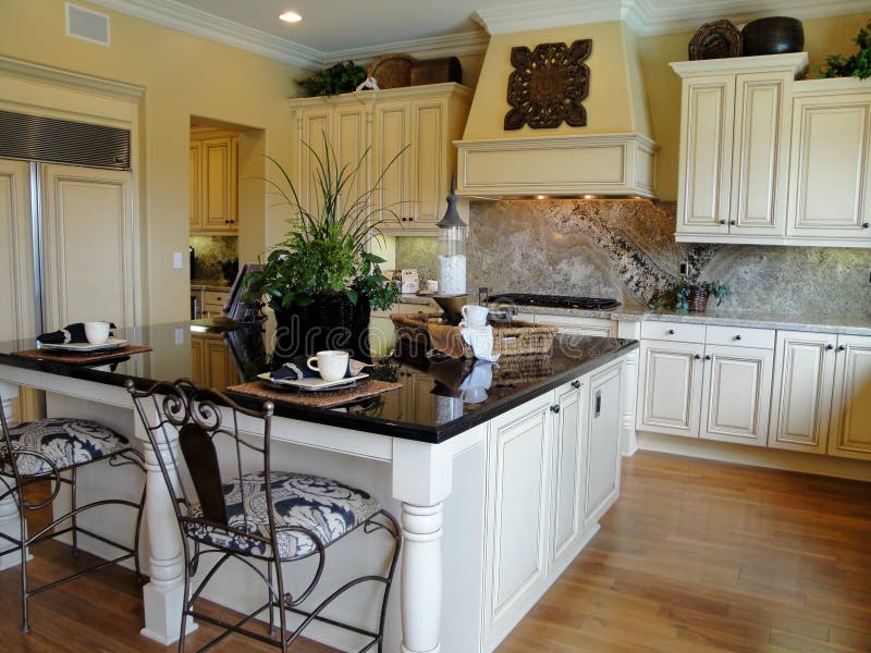 Kitchen Interior with Stone Accents in Affluent Ho Stock Photo - Image ...