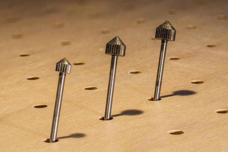 Beveled cutting bit trio stock image. Image of craftsmanship - 29678741