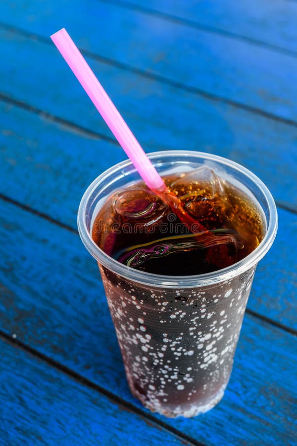Beverage Cola with straw stock photo. Image of fresh - 76613182