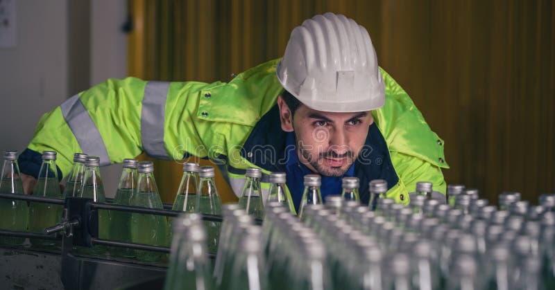 Production Line Supervisor and Worker Work Together in Beverage ...