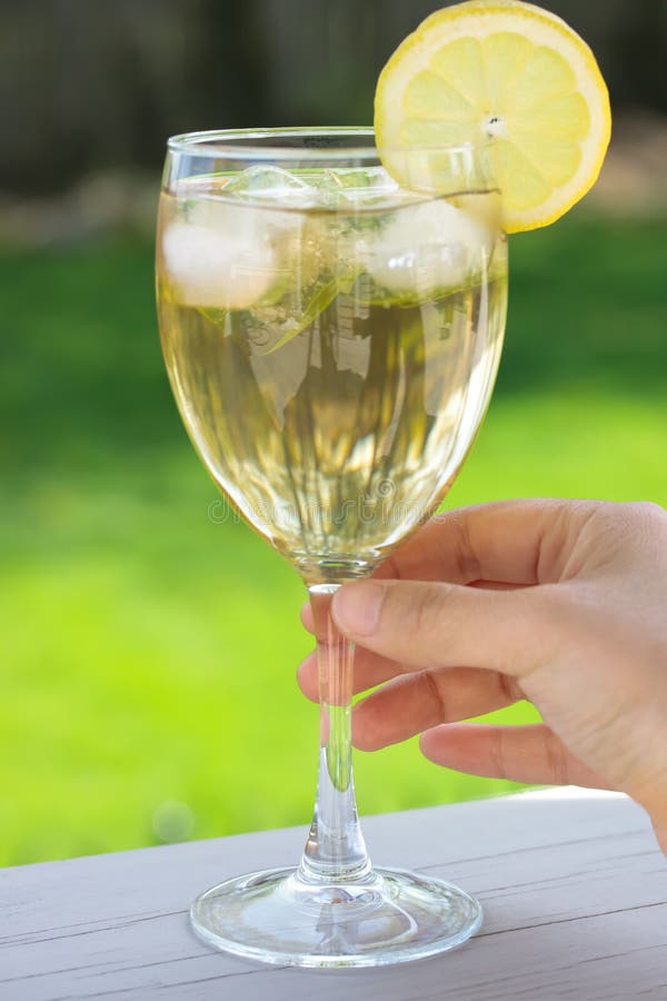Beverage with Lemon in Wine Glass Stock Image - Image of green ...