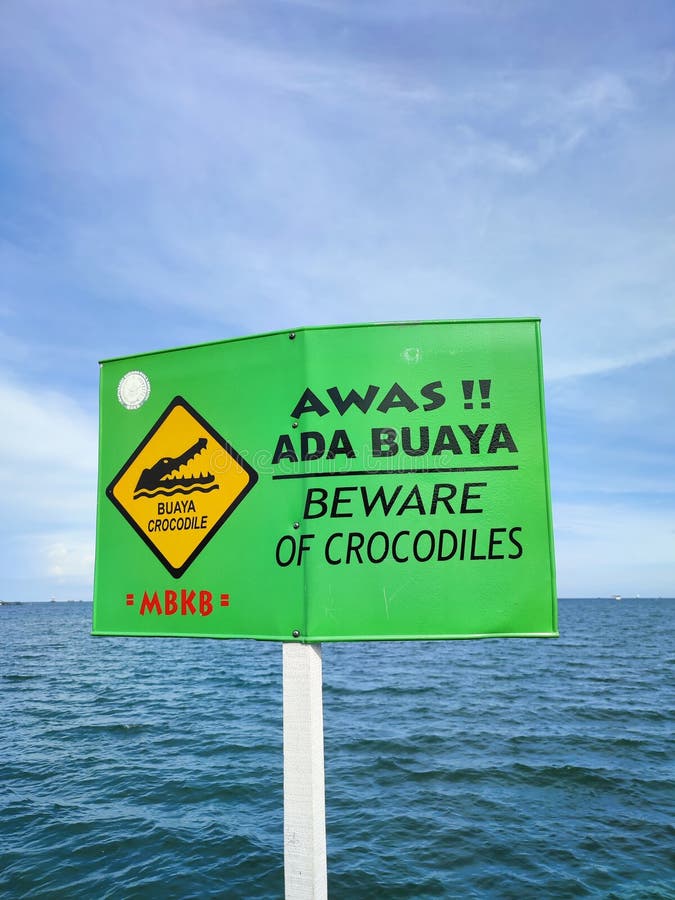 Beware of crocodile editorial stock image. Image of trip - 114676554