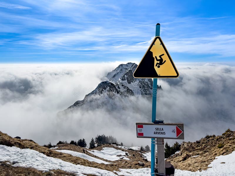 Beware of Falling Sign at the Cliff Side Stock Image - Image of clouds ...