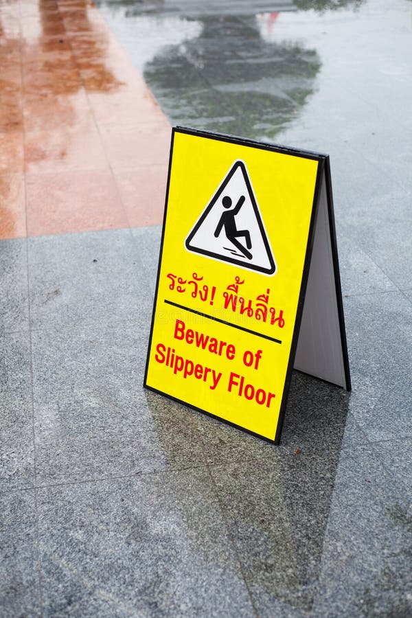 Beware Slippery And Uneven Paths Sign. Stock Image - Image of garden ...