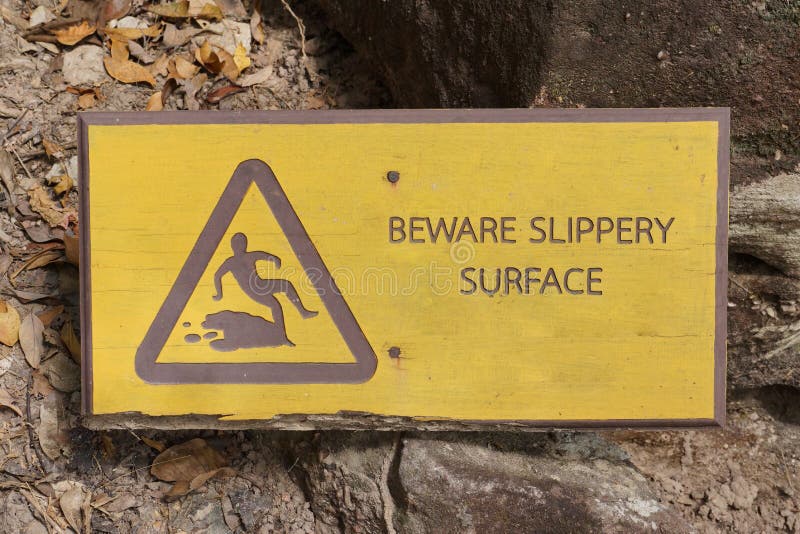 Beware Slippery Surface Sign Stock Photo - Image of hazard, nature ...