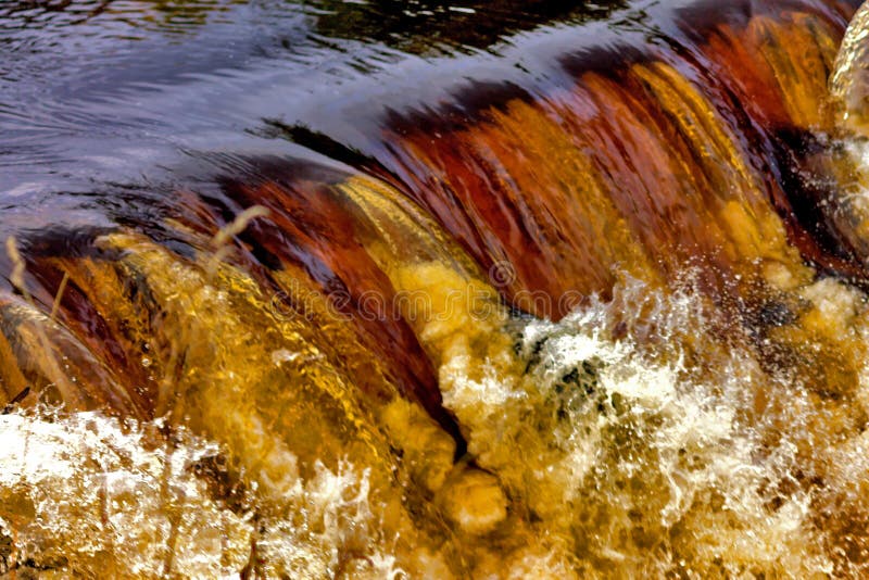 The Bewitching Beauty of a Small Waterfall on the River Stock Photo ...