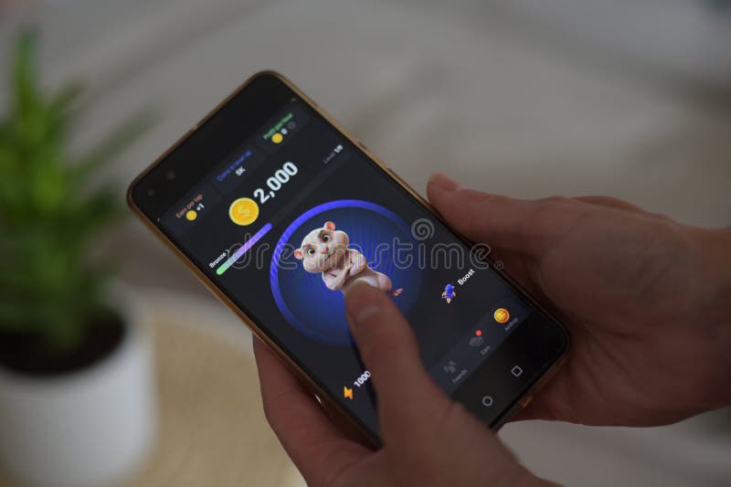 Bialystok, Poland. July 04 2024: Hamster Kombat Telegram Bot on IPhone ...