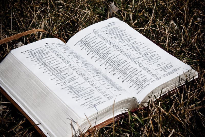 Holy bible laying opened stock photo. Image of full - 134405128