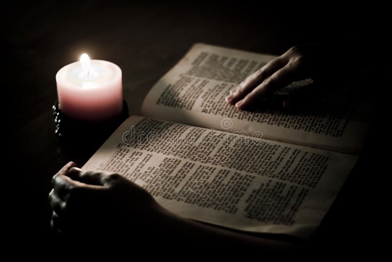 Open Bible With Candle