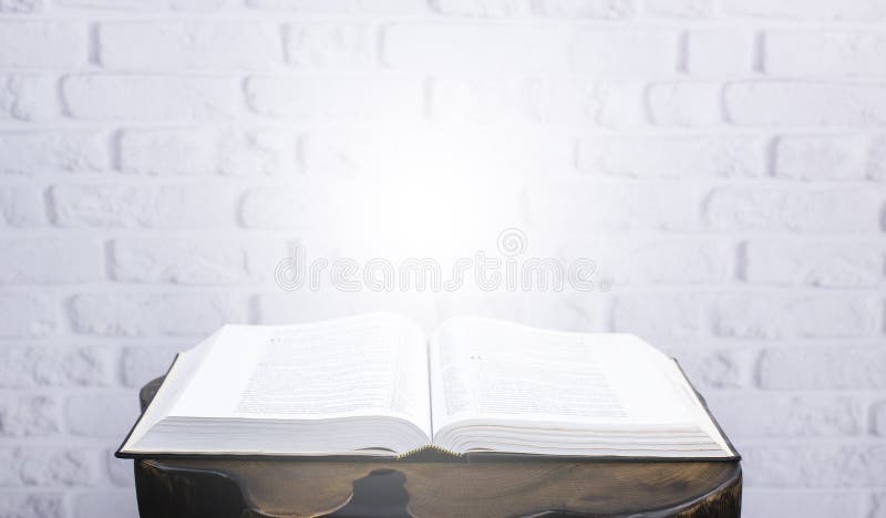 The Bible is an Open Book. the Light Falls on the Book. Prayer. Pages ...
