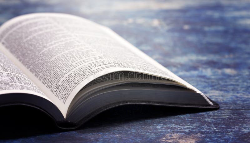 Open Bible on a Wooden Table Stock Image - Image of religion, wooden ...