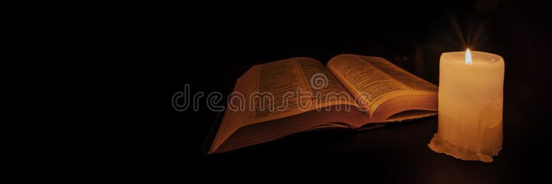 A Bible on the Table in the Light of a Candle Stock Image - Image of ...