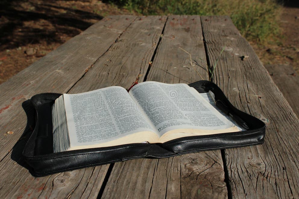 Bible on Wood Table stock image. Image of bible, open - 27090471