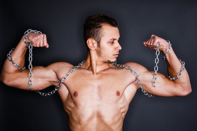 Biceps with chains stock photo. Image of shaped, tense - 59230544