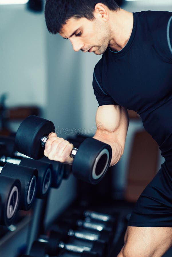 Biceps exercise stock image. Image of healthy, large - 222774281