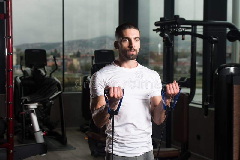 Biceps Exercising with Pull Rope Elastic Cable Stock Photo - Image of ...