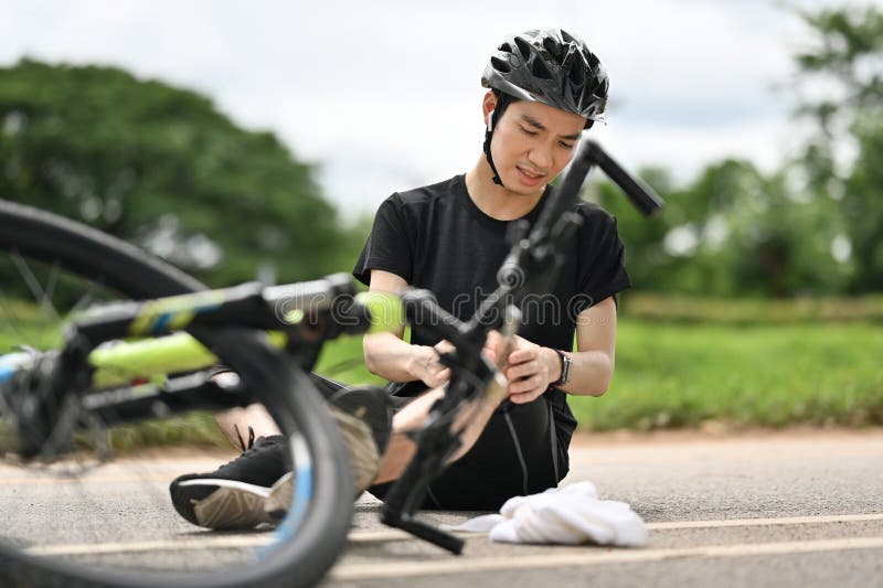 Bicycle Accident. Young Cyclist Having an Accident, Falling Down from ...