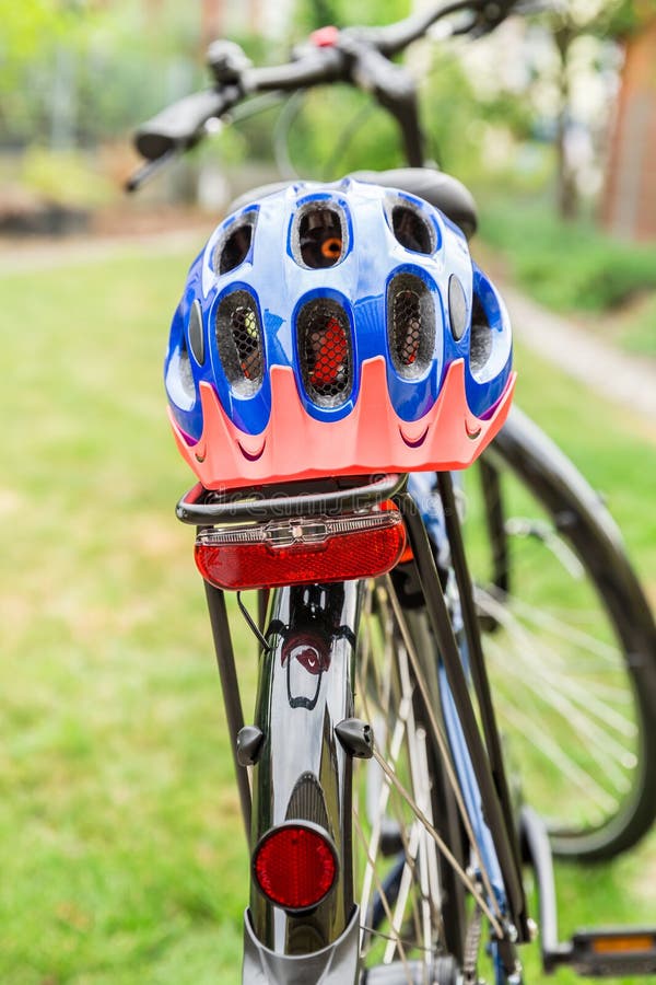 Bicycle with Bike Helmet on the Rack Stock Photo - Image of adventure ...