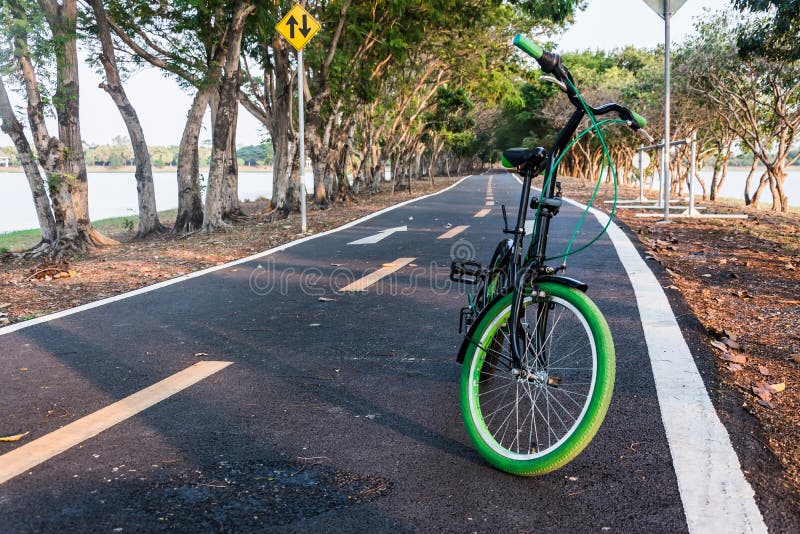 Bicycle on the bike path stock image. Image of cyclist - 69232399