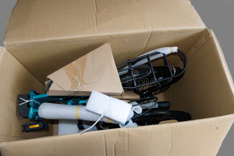 Bicycle in a box stock photo. Image of buying, fold - 343631204