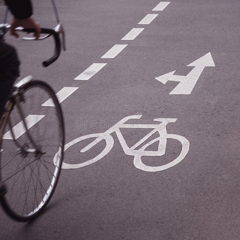 Bicycle on a Cycle Path with a Bicycle Symbol and Arrows Stock Image ...