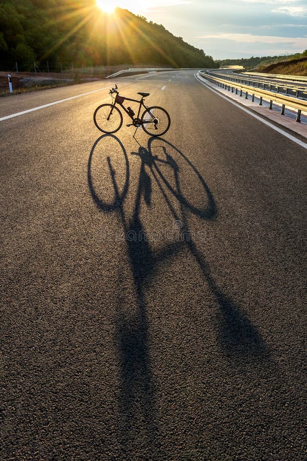Bicycle on the Highway stock photo. Image of speed, highway - 101497806