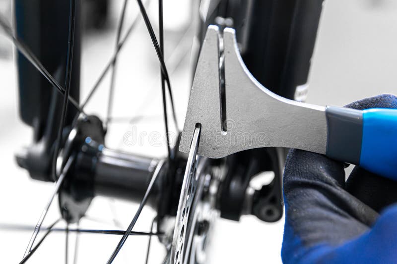 Bicycle Hydraulic Brake Disc Alignment Using a Special Tool. Stock ...