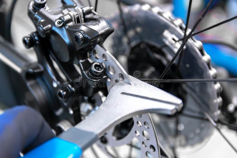 Bicycle Hydraulic Brake Disc Alignment Using a Special Tool. Stock ...