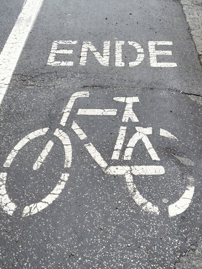 Bicycle Lane End Marking on Asphalt Surface with Ende Text Stock Photo ...