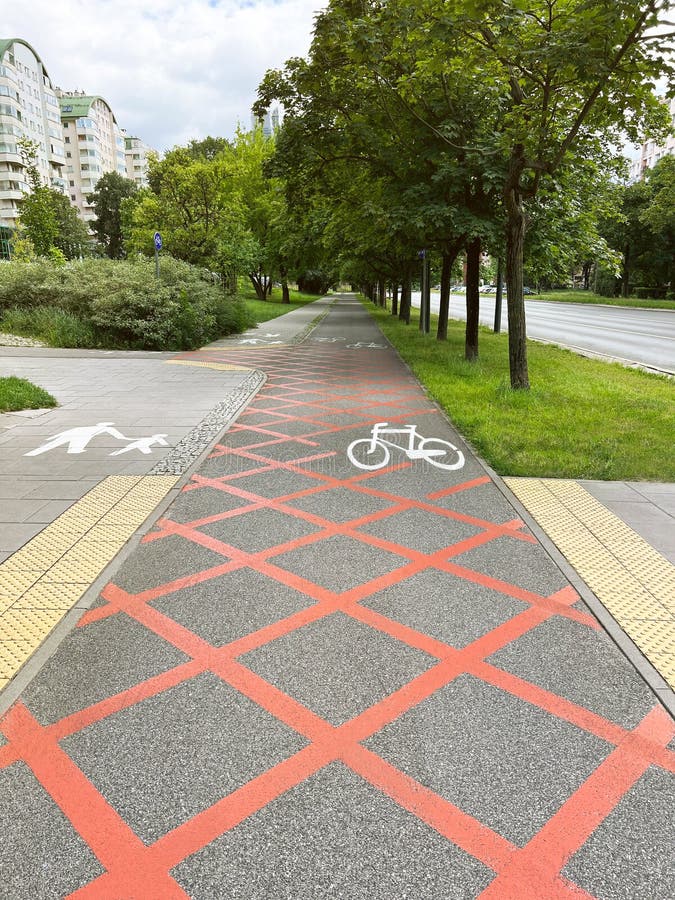 Bicycle Lane with Signs Painted on Asphalt in City Stock Photo - Image ...
