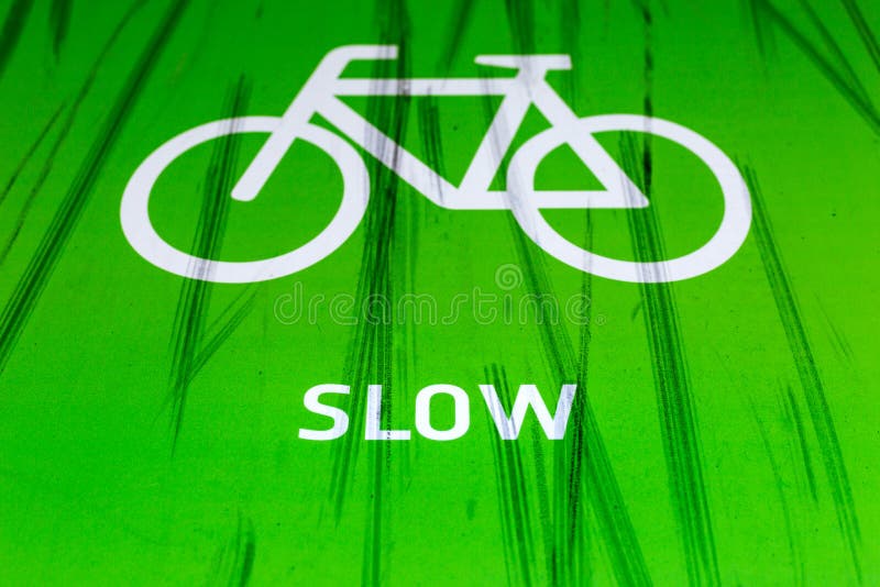 Bicycle Lane with Slow Warning Stock Image - Image of information ...