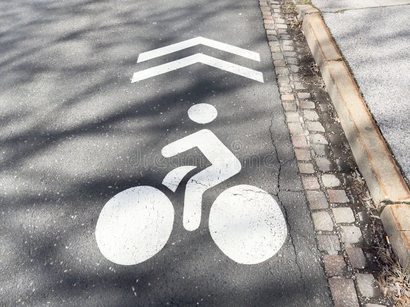 Bicycle Lane Symbol on Asphalt Road with Directional Arrow Stock Photo ...