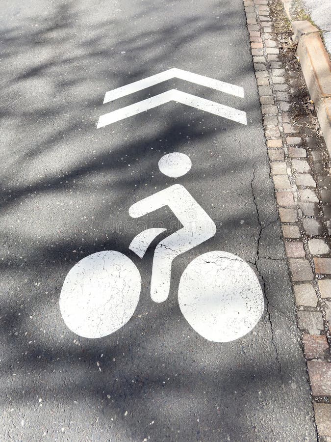 Bicycle Lane Symbol on Asphalt Road with Directional Arrows Stock Photo ...