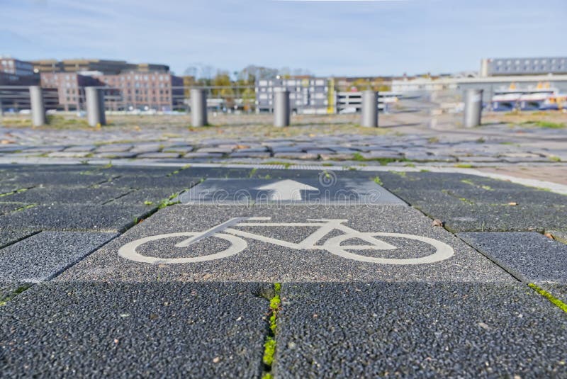 Bicycle Lane Symbol on Urban Pathway Stock Photo - Image of line, city ...