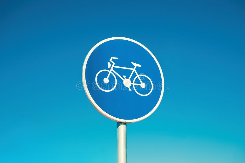 Bicycle Lane Traffic Sign Against Clear Blue Sky Stock Photos - Free ...