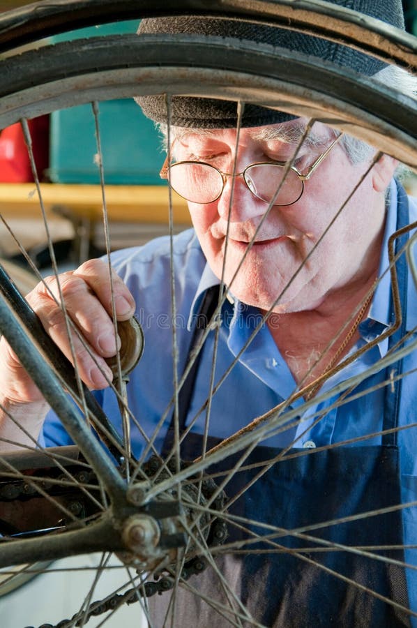 Bicycle mechanic at work stock image. Image of hands - 45730569