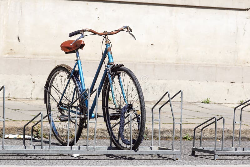 Bicycle Parked in the Street on the Bicycle Rack Stock Image - Image of ...