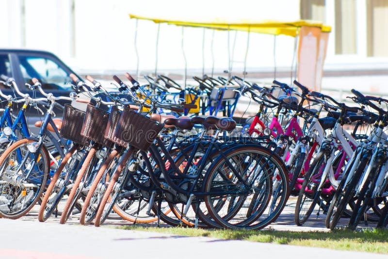 Bicycle Parking Area with Group of Colorful Bicycles Parked Together ...