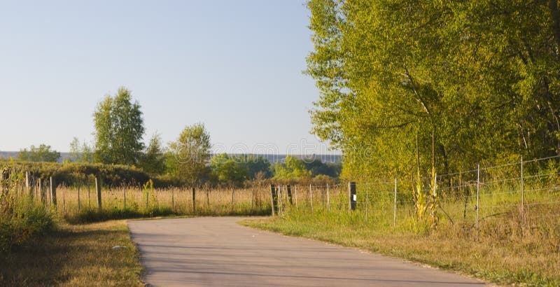 Bicycle Path through Autumn Countryside Stock Image - Image of bend ...