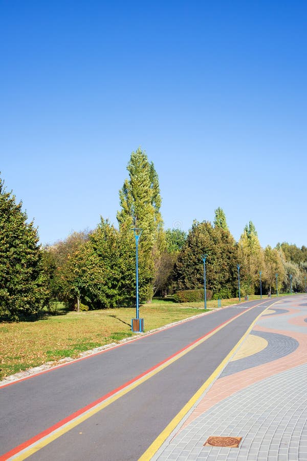 Bicycle Path in a Park stock image. Image of blue, copyspace - 22098541