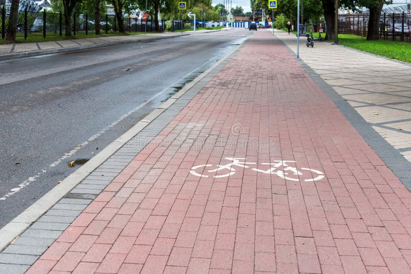 Bicycle Path Sign on a Tiled Sidewalk. Stock Photo - Image of sign ...