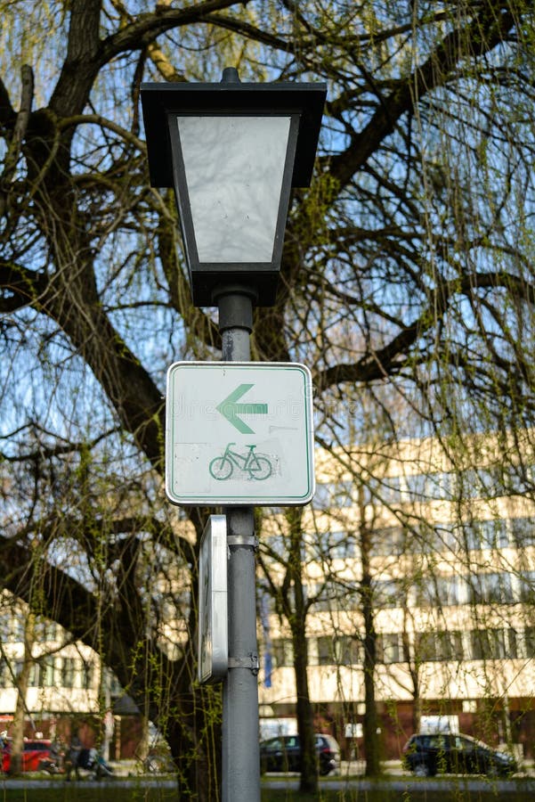 Bicycle path street sign stock image. Image of buildings - 89755487