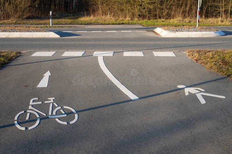Bicycle and Pedestrian Path with Road Markings. Signs on Asphalt Stock ...