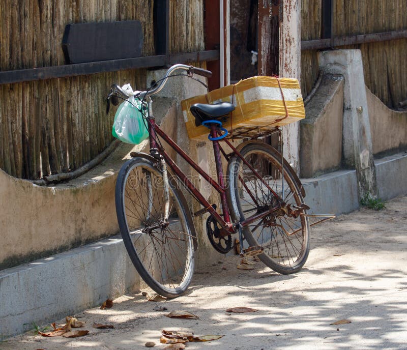 A Bicycle with a Plastic Bag on the Back Stock Image - Image of ride ...